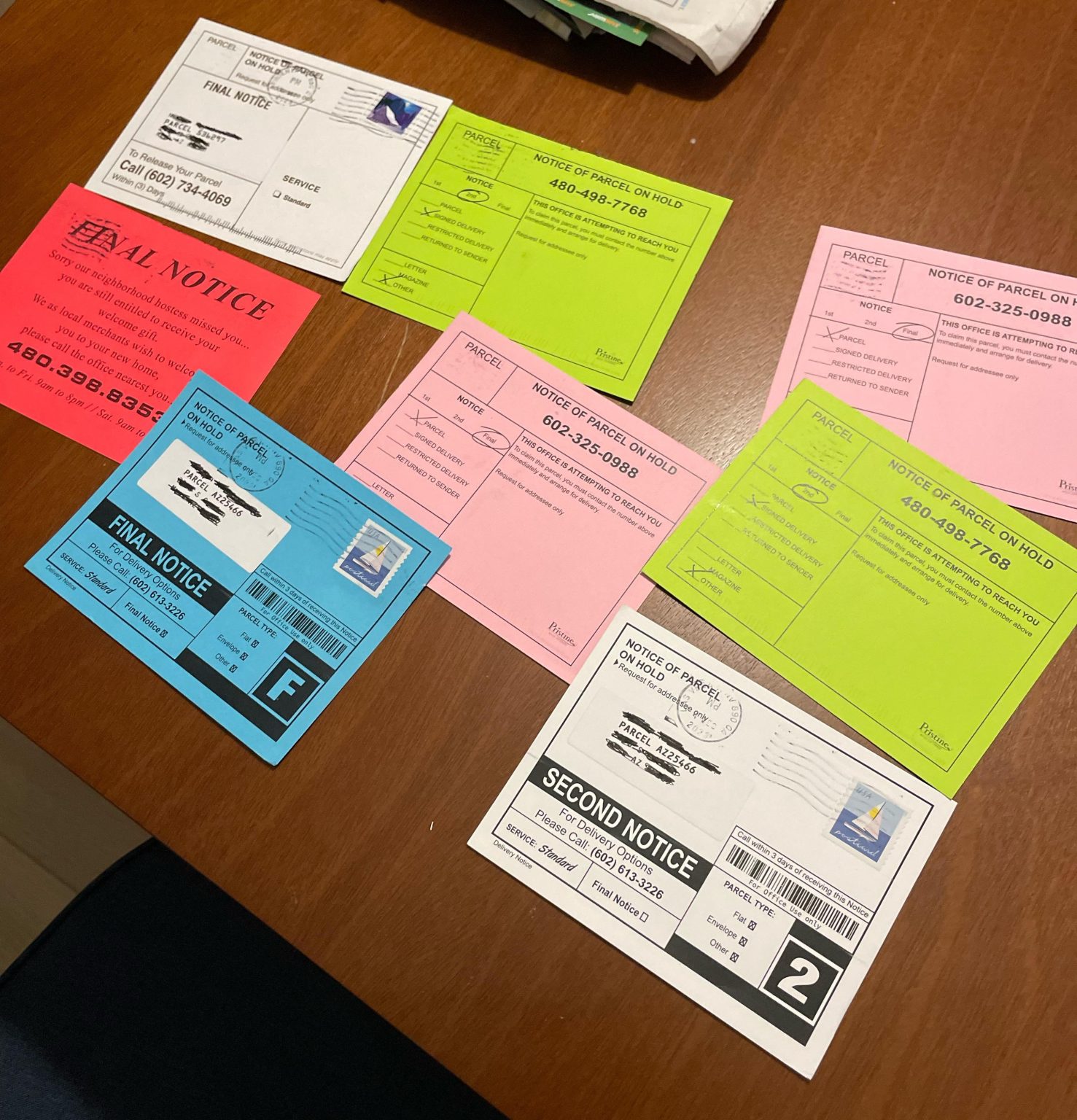 Notice Of Parcel On Hold Scam Postcard – MK Library